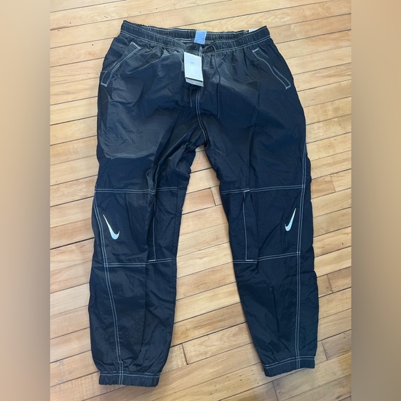 Nike | Pants & Jumpsuits | Nwt Nike Oversized Fit High Rise Repel ...